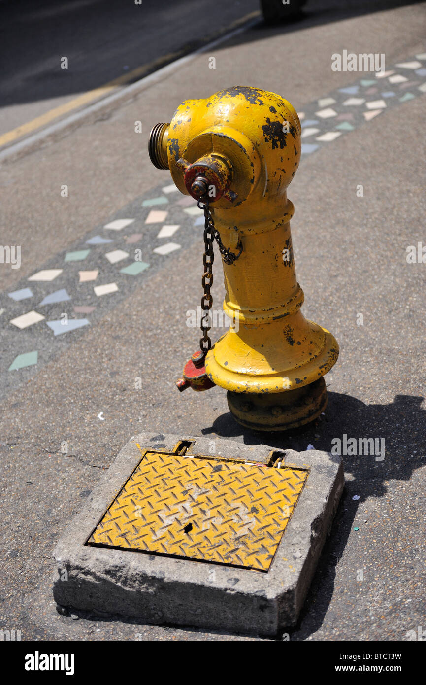 Yellow fire hydrant in Kuala Lumpur Stock Photo - Alamy