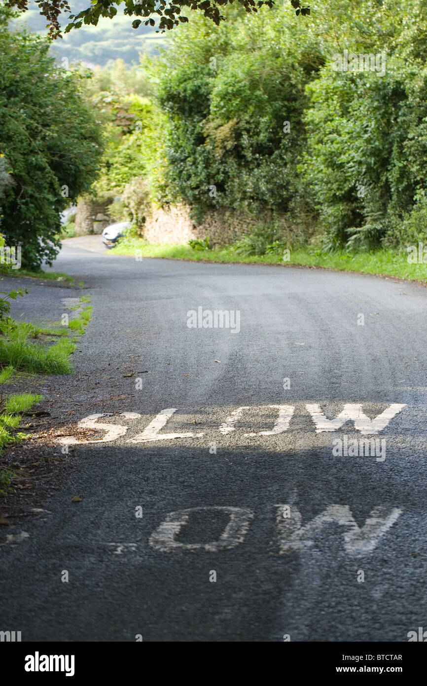 Road Sign, Slow. Warning to oncoming vehicles on an incline. Lancashire ...