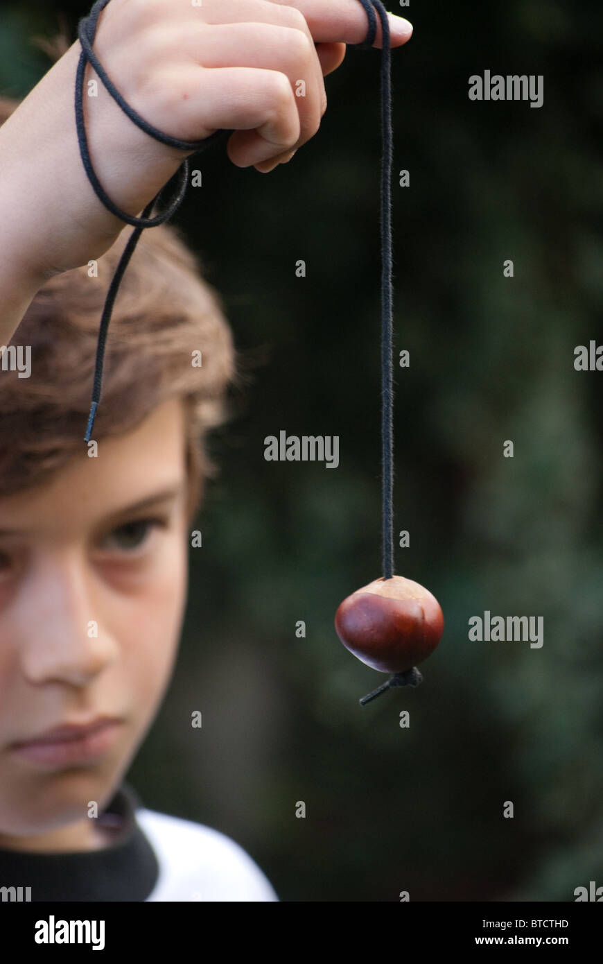 Conker on string hi-res stock photography and images - Alamy