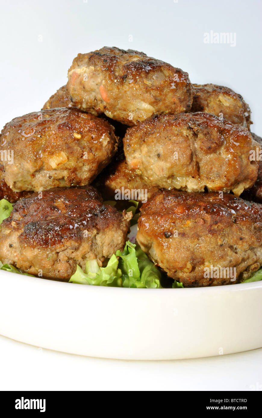 rissole with organic salad on a plate Stock Photo - Alamy