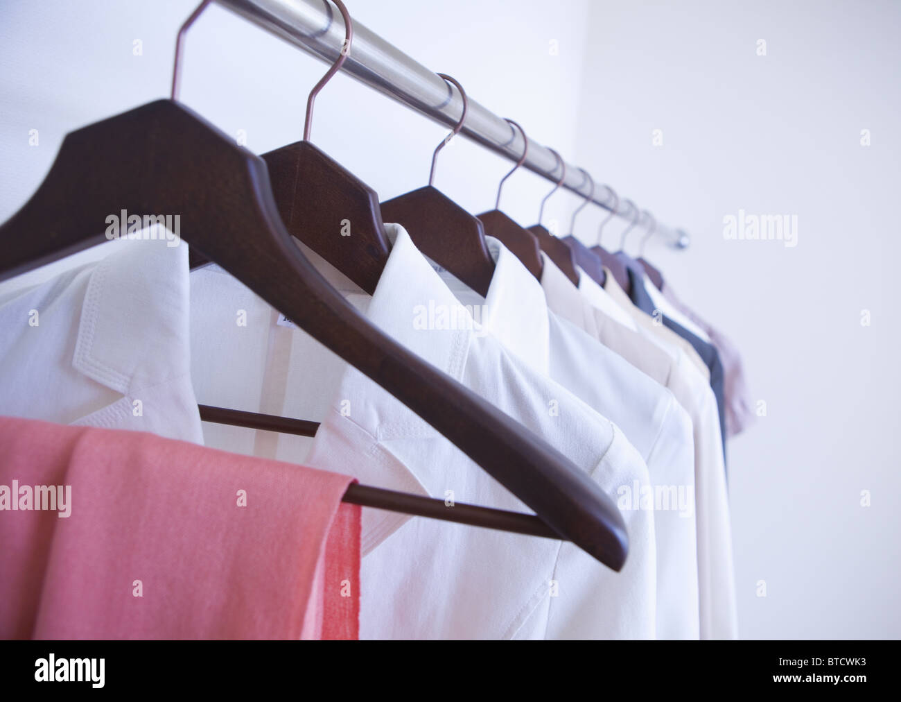 Clothes on hangers Stock Photo - Alamy