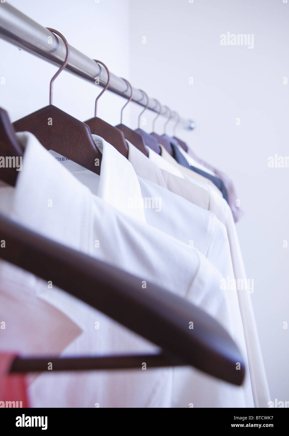 Clothes on hangers Stock Photo - Alamy