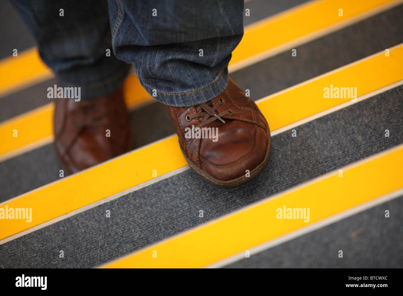 Feet on stairs hi-res stock photography and images - Alamy