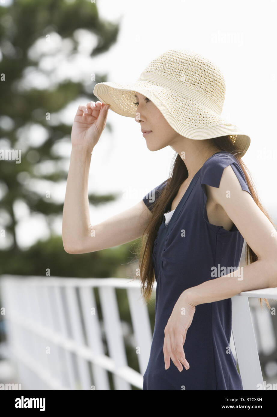 Woman looking into the distance Stock Photo - Alamy