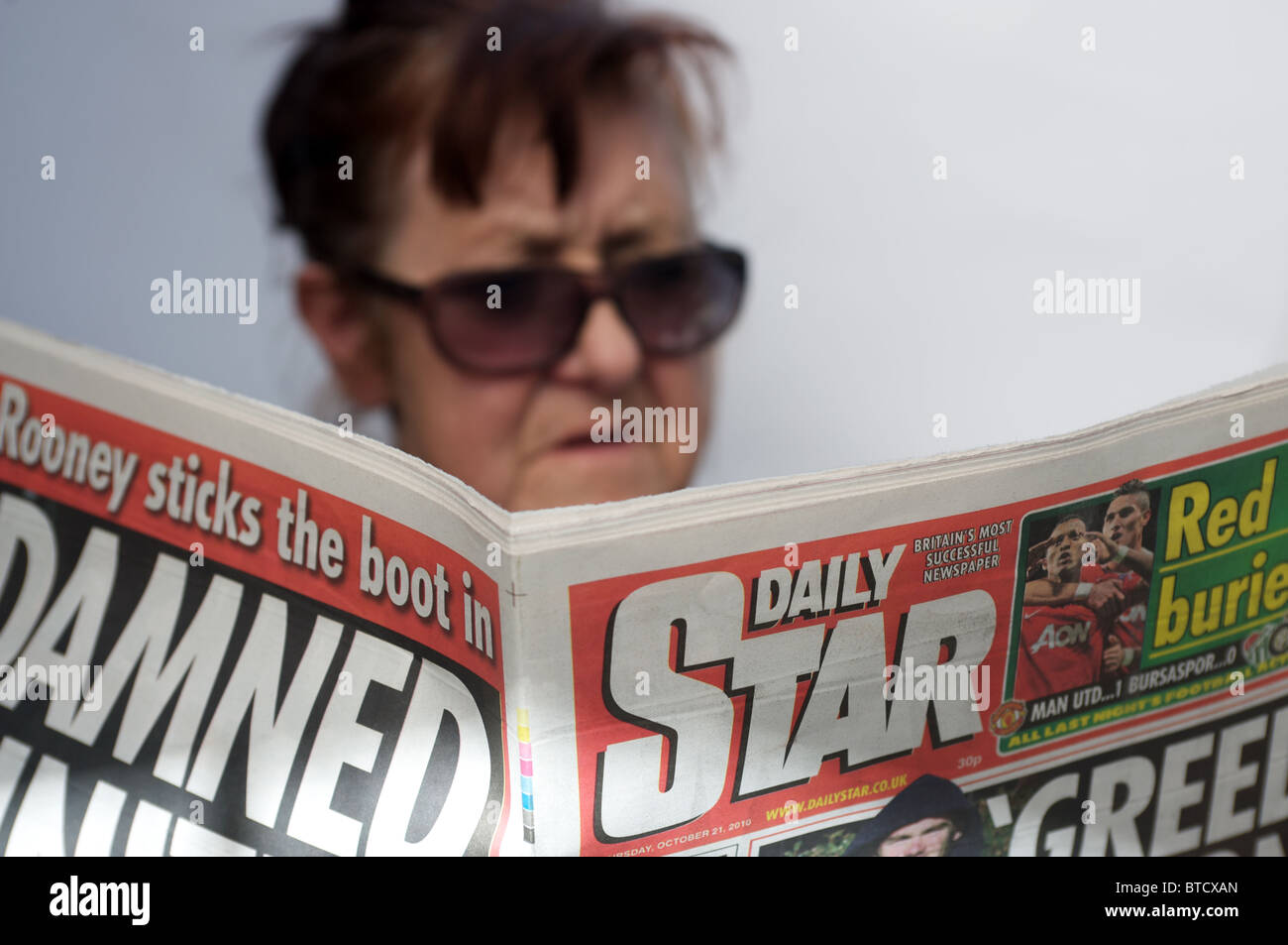 Woman Reading A Copy Of The Daily Star Newspaper Stock Photo Alamy woman-reading-a-copy-of-the-daily-star-newspaper-stock-photo-alamy