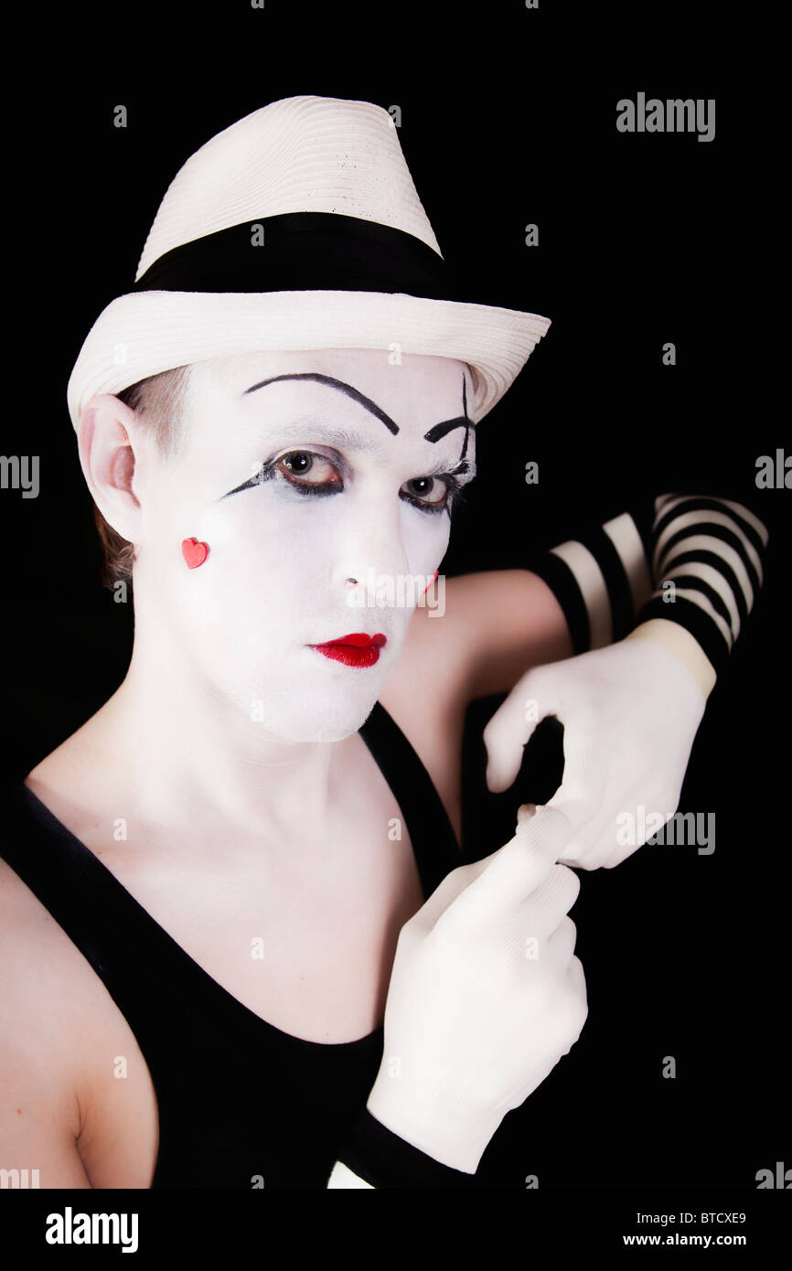 mime in striped gloves and white hat Stock Photo - Alamy