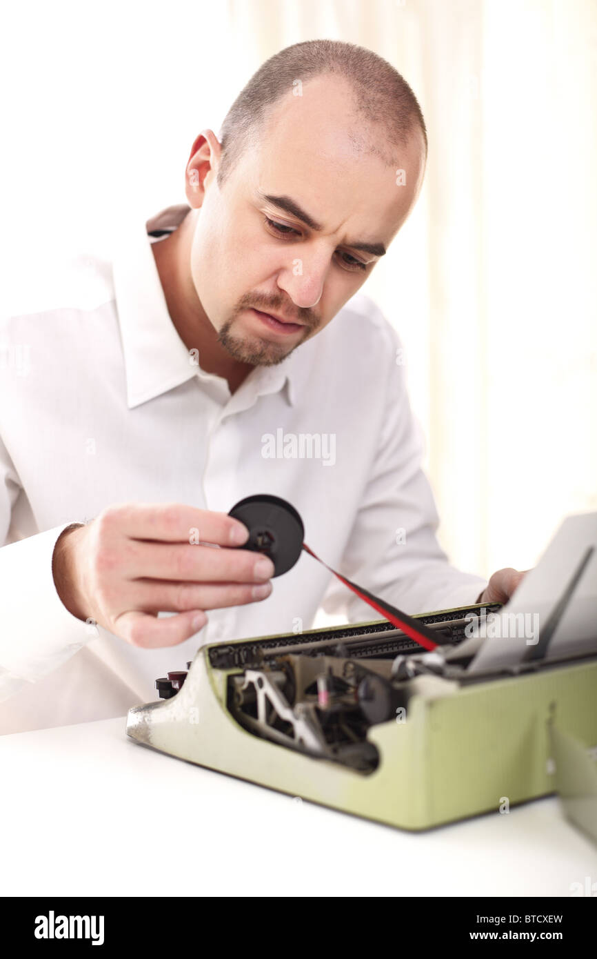 man with vintage typewriter Stock Photo - Alamy