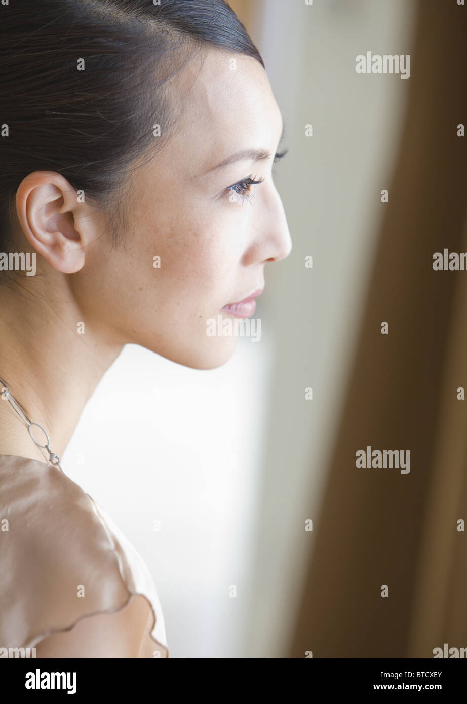 Woman in profile Stock Photo - Alamy