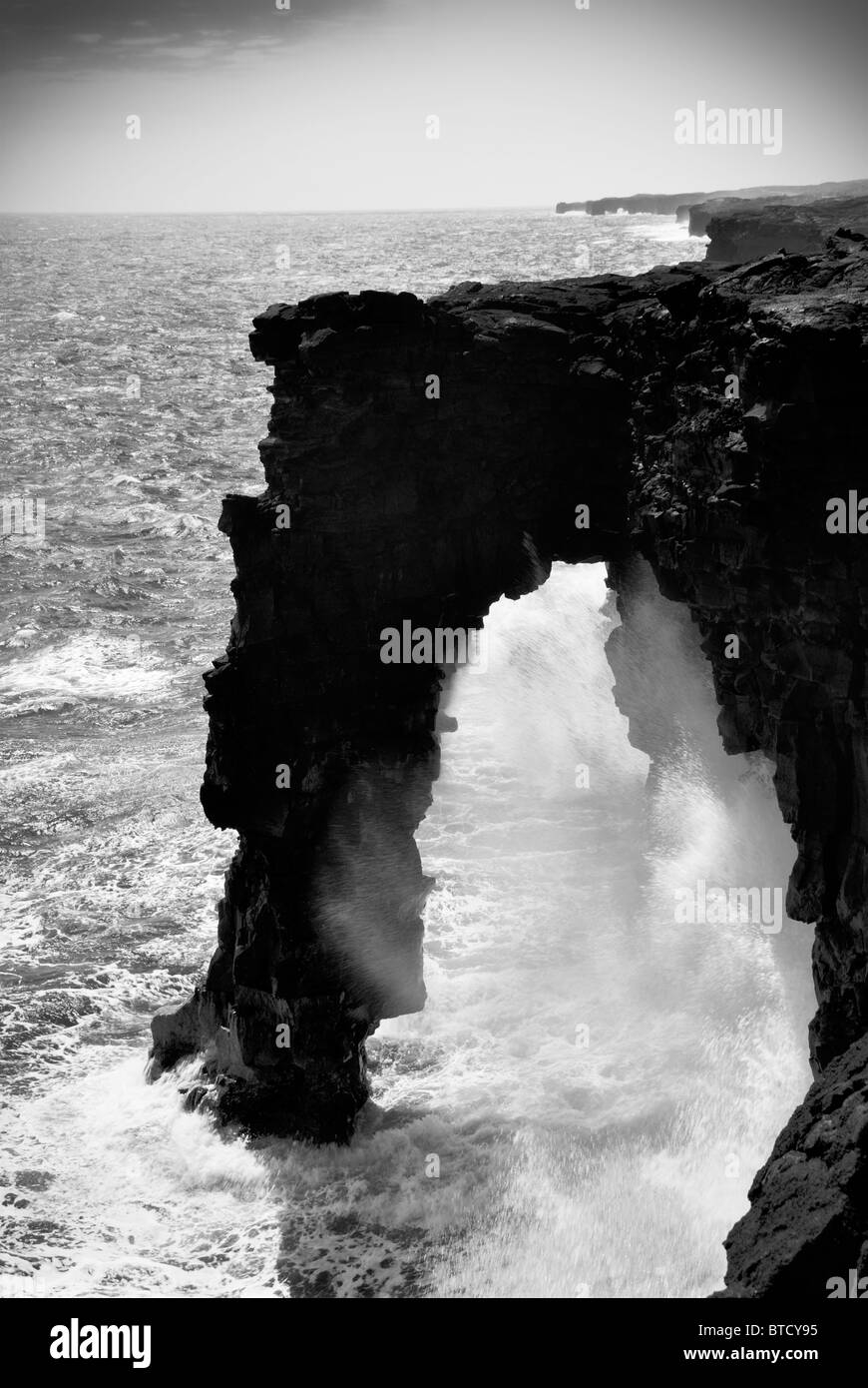 Cliffs and windswept coast created by lava. Chain of Craters Road ...