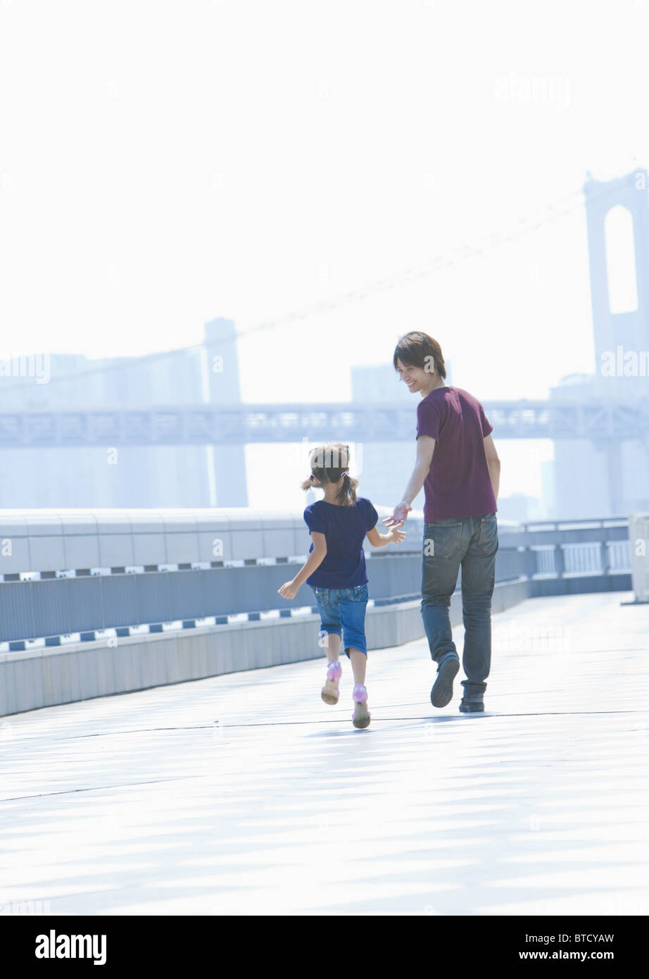 Father and daughter taking a walk Stock Photo - Alamy