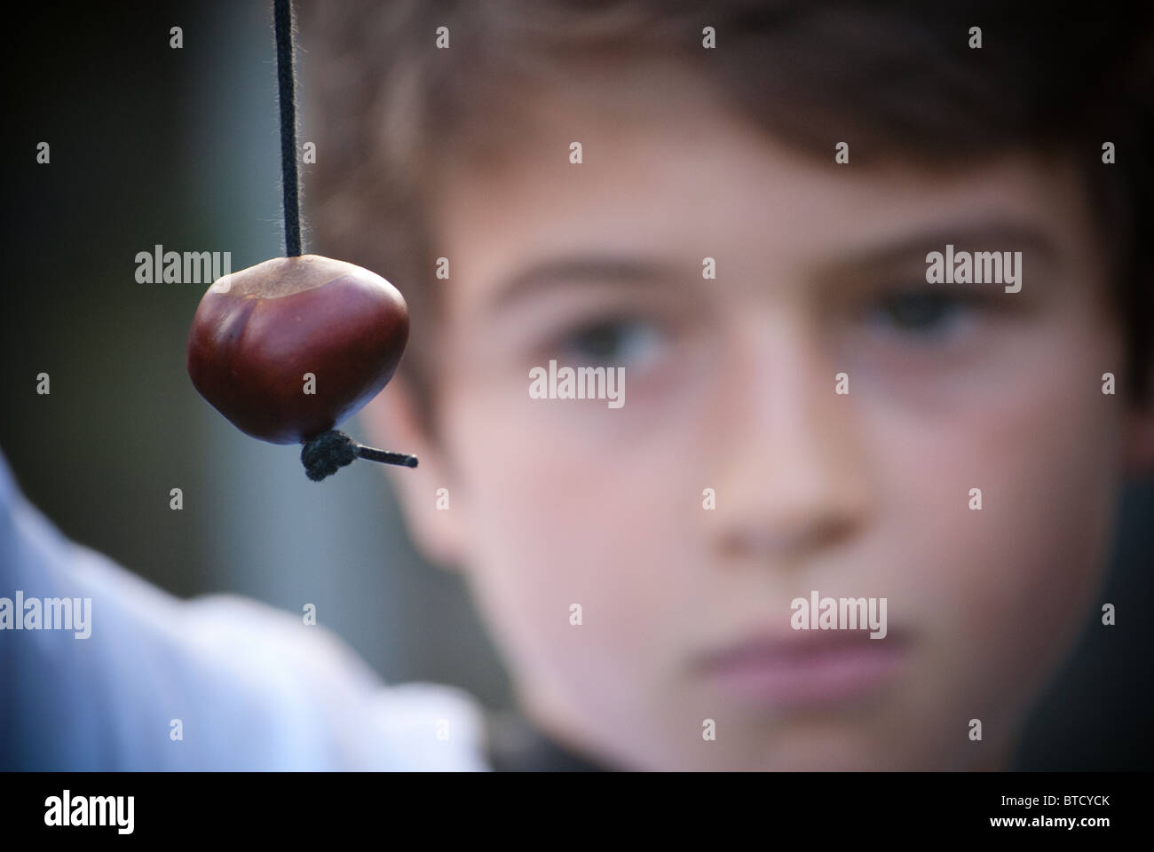 Boy holds on string game hi-res stock photography and images - Alamy