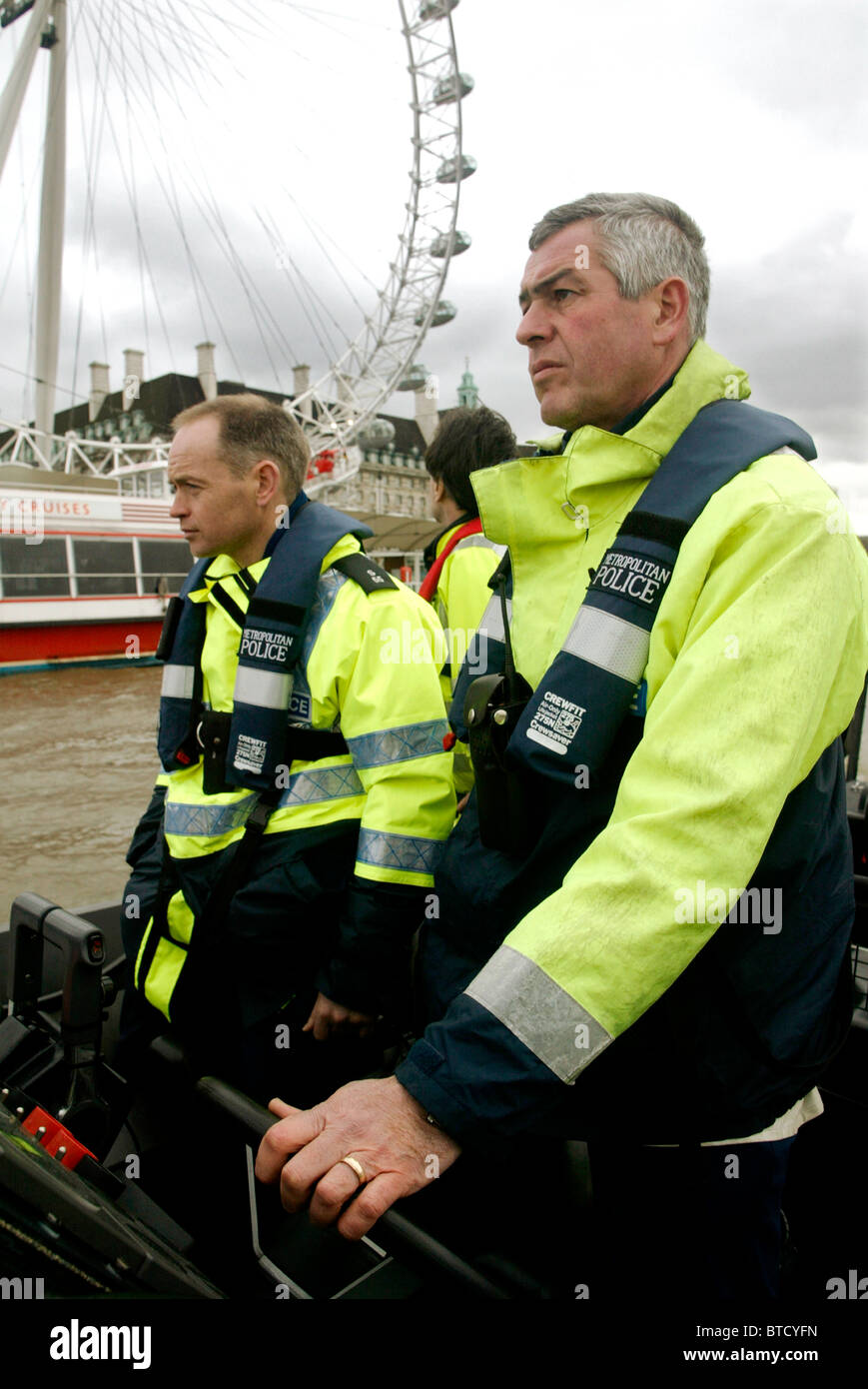 Metropolitan Police Marine Policing unit patrolling the river Thames ...