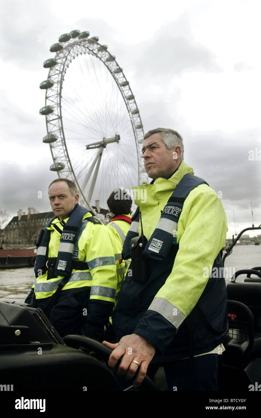 Metropolitan Police Marine Policing unit patrolling the river Thames ...