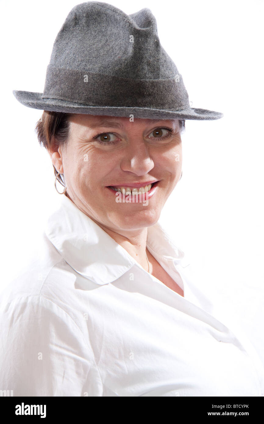 Smiling woman wearing cap in hi-res stock photography and images - Alamy
