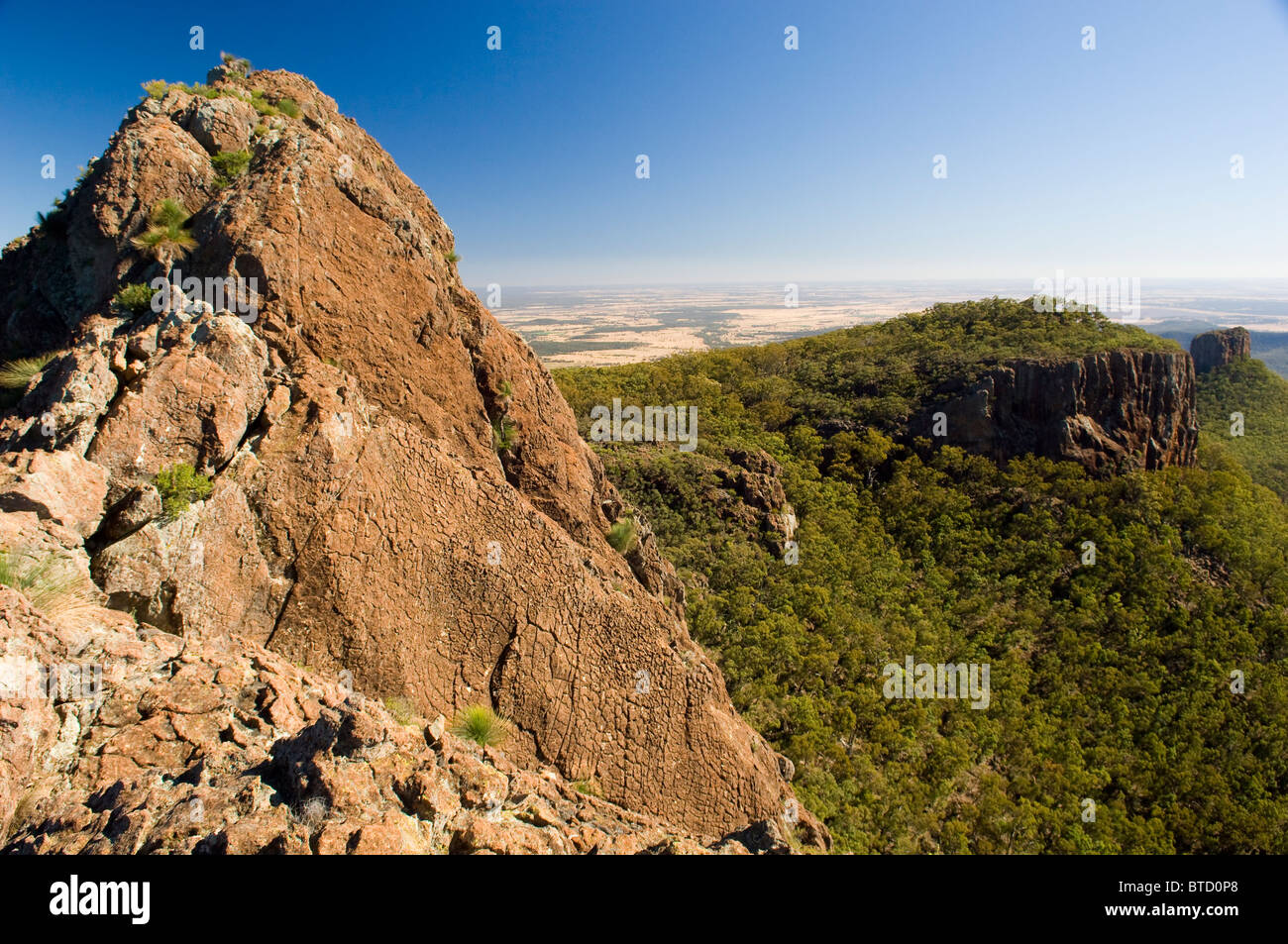 Rich red and orange tones in a rocky ridge-line Stock Photo - Alamy