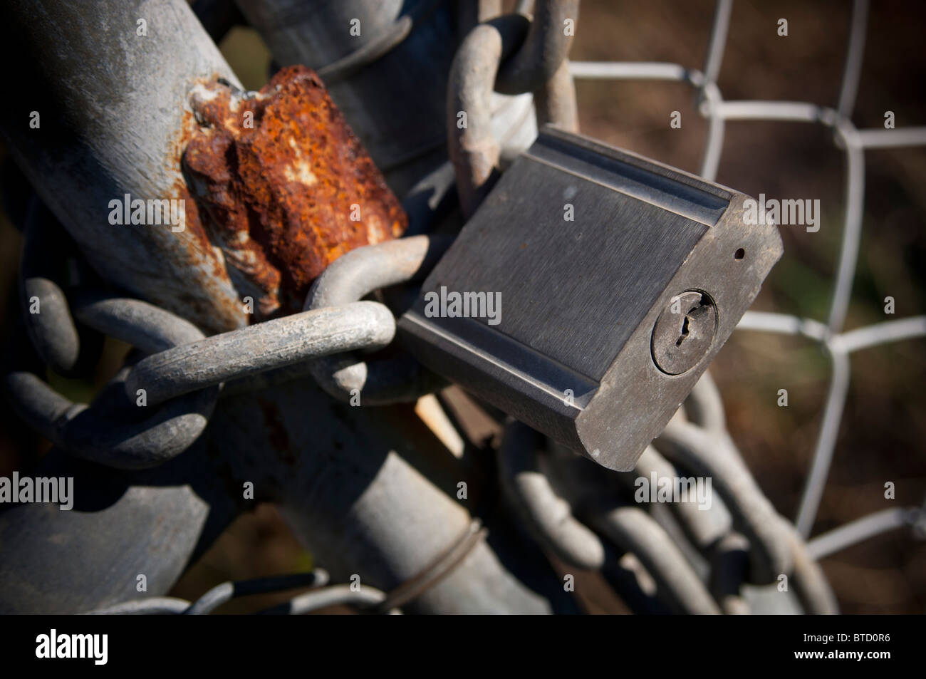 Big door lock on chain hi-res stock photography and images - Alamy