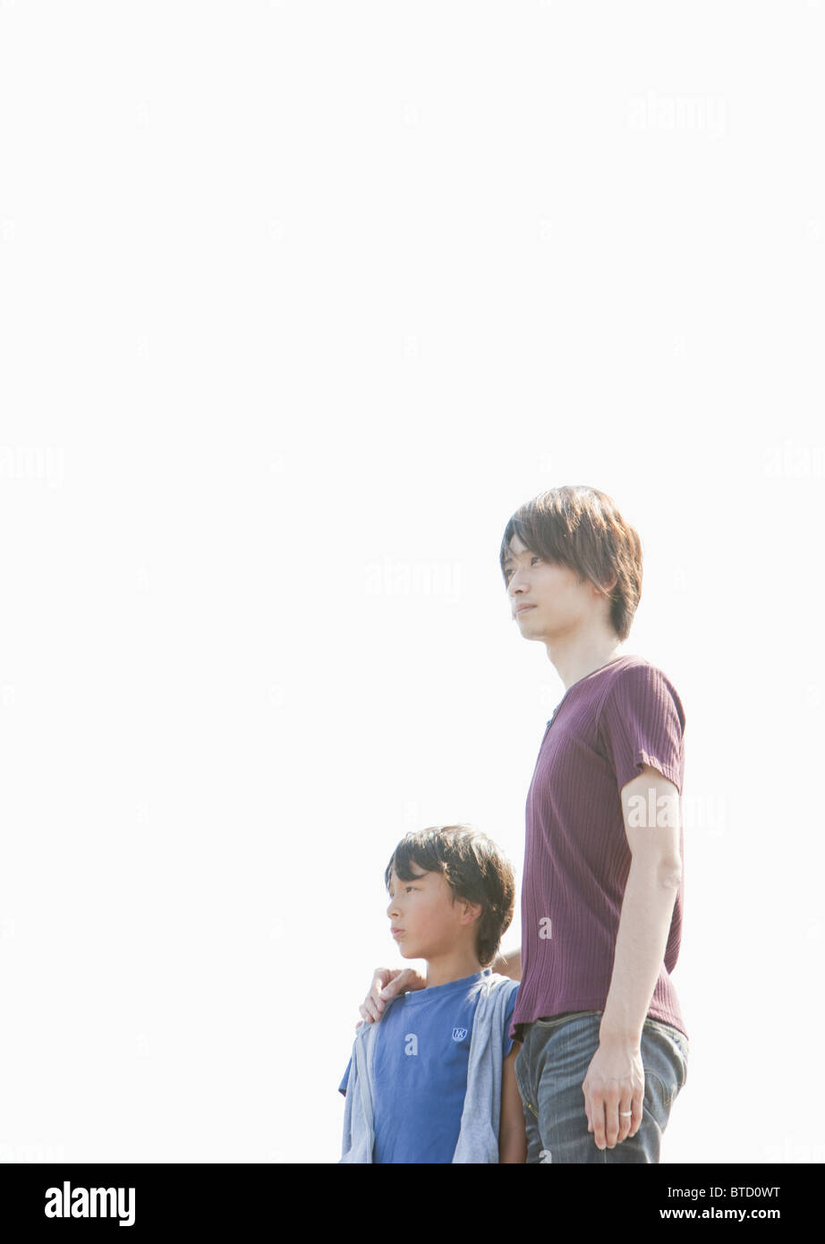 Father and son standing Stock Photo - Alamy