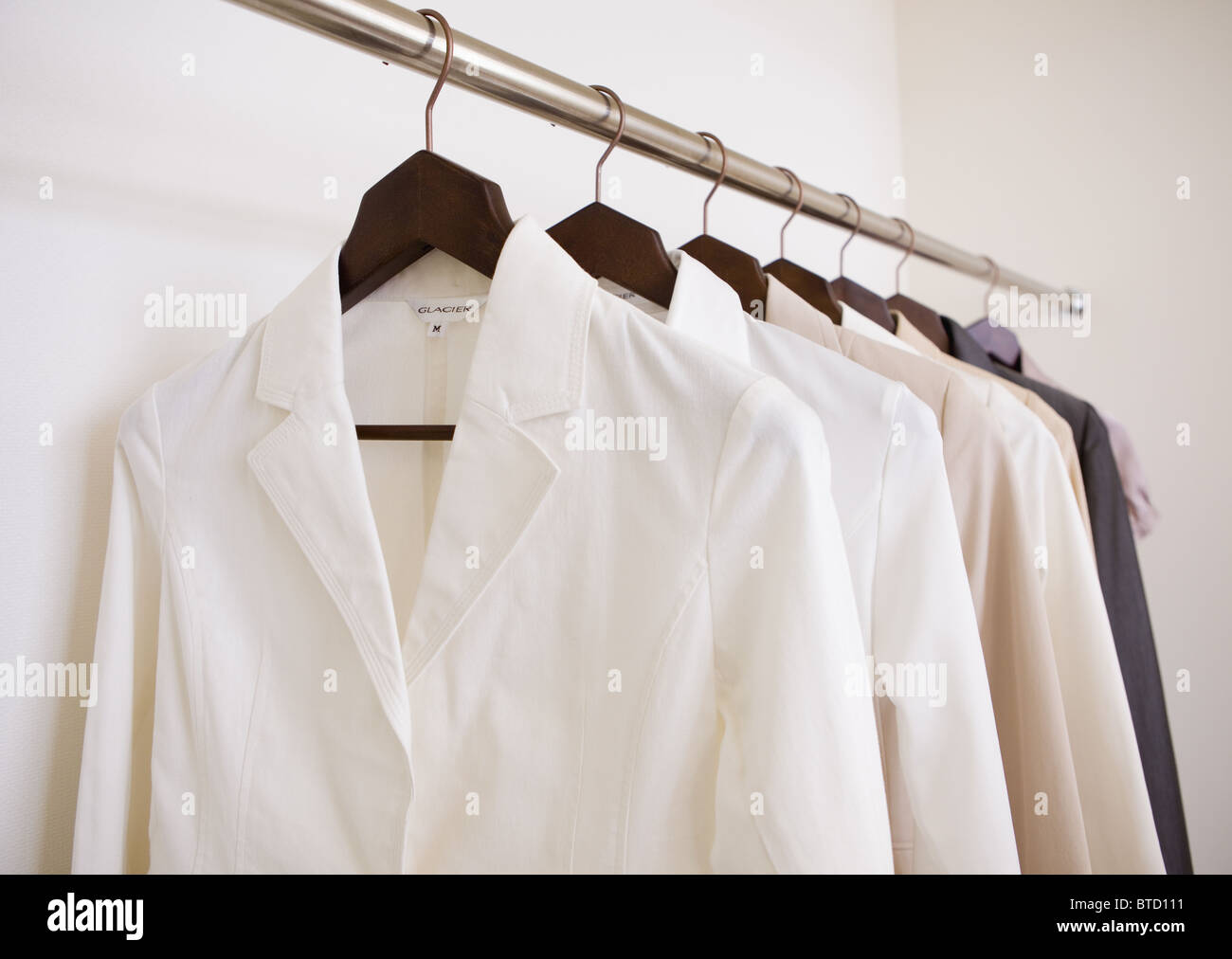 Clothes on hangers Stock Photo - Alamy