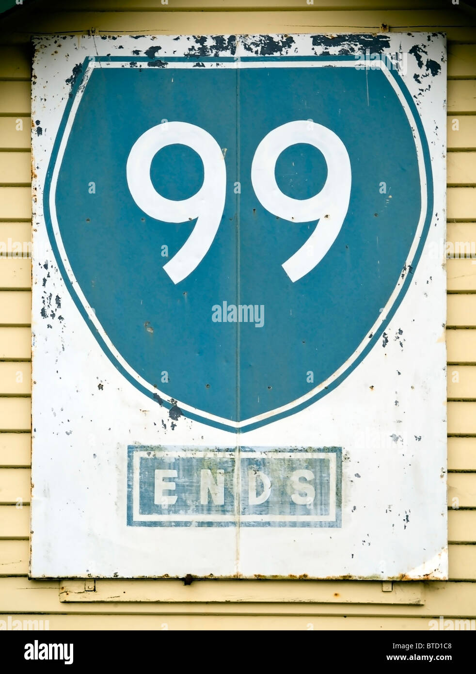 Old American style sign reads Route 99 stuck onto a wall Stock Photo ...