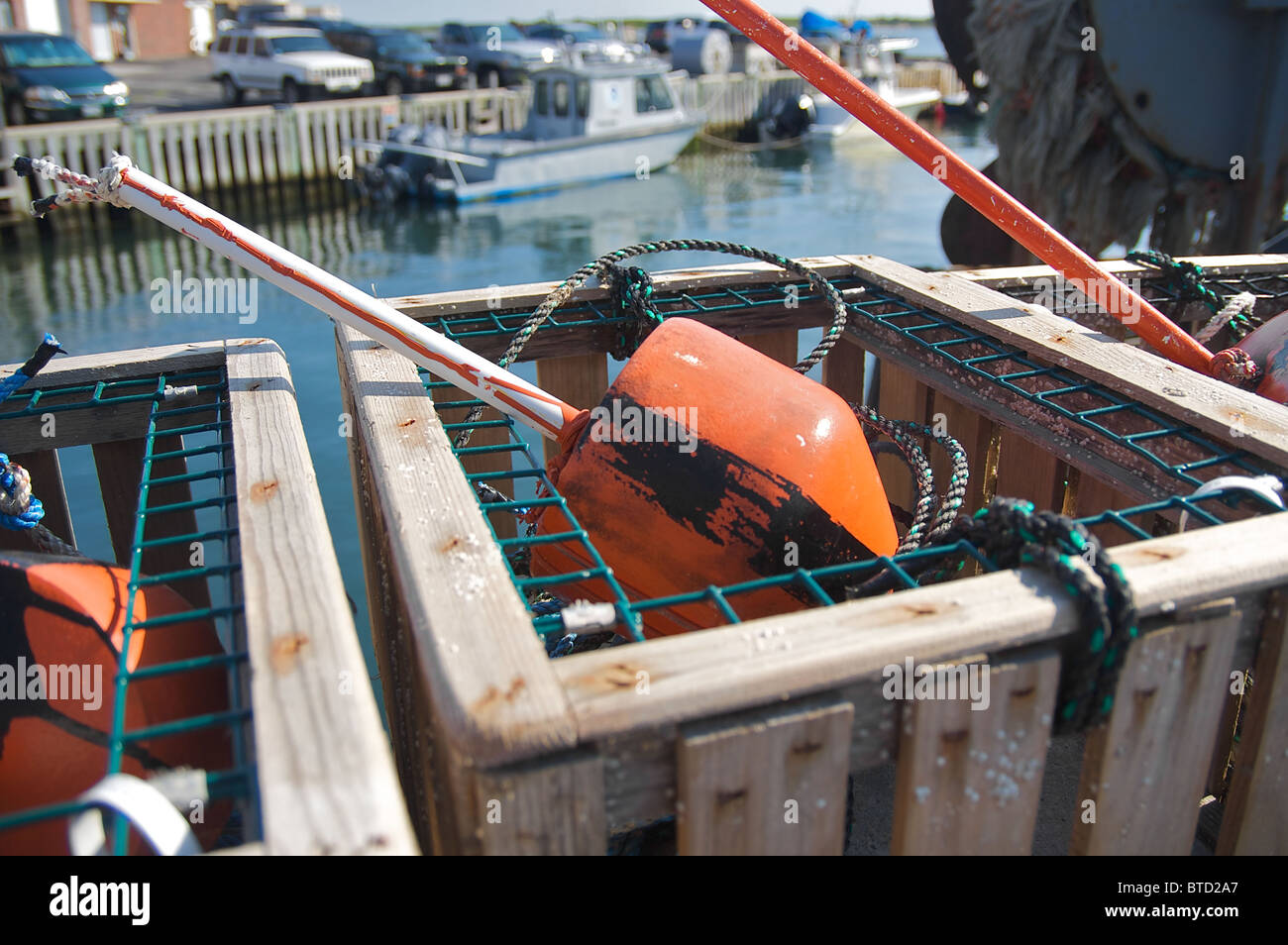 Orange buoys in containers in the Cape Cod village of Woods Hole Stock ...