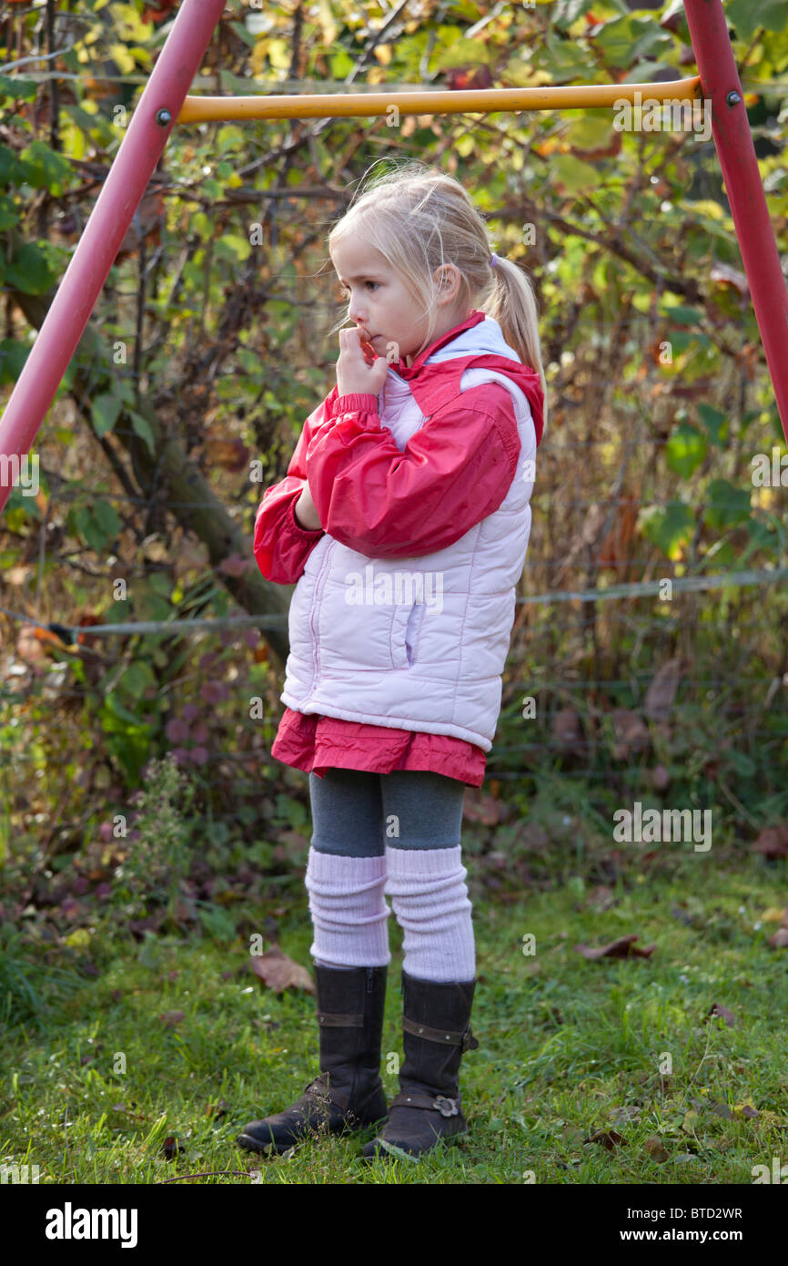 portrait of a musing little girl Stock Photo - Alamy