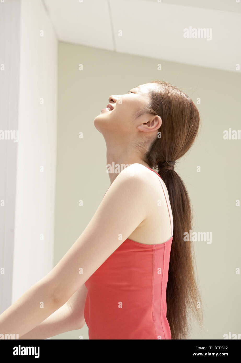 Woman looking up Stock Photo - Alamy