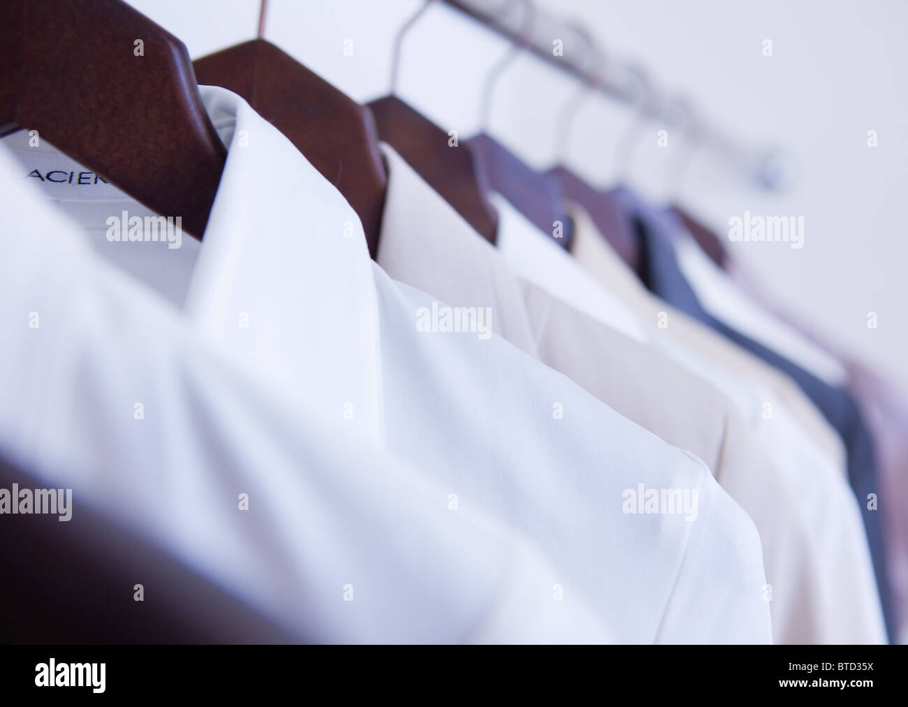 Clothes on hangers Stock Photo - Alamy