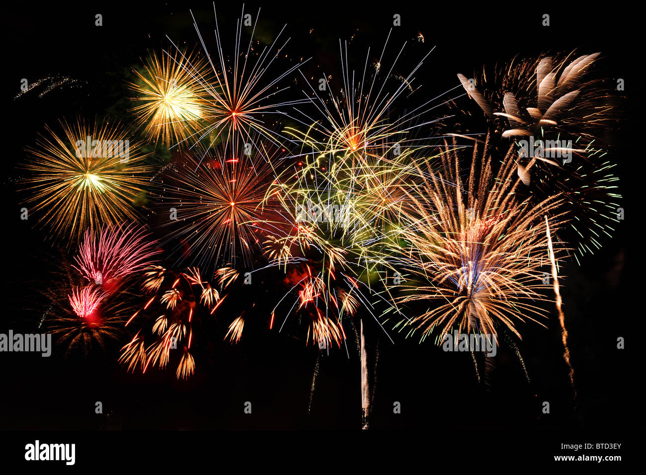 Fireworks of different colors against a dark sky Stock Photo - Alamy