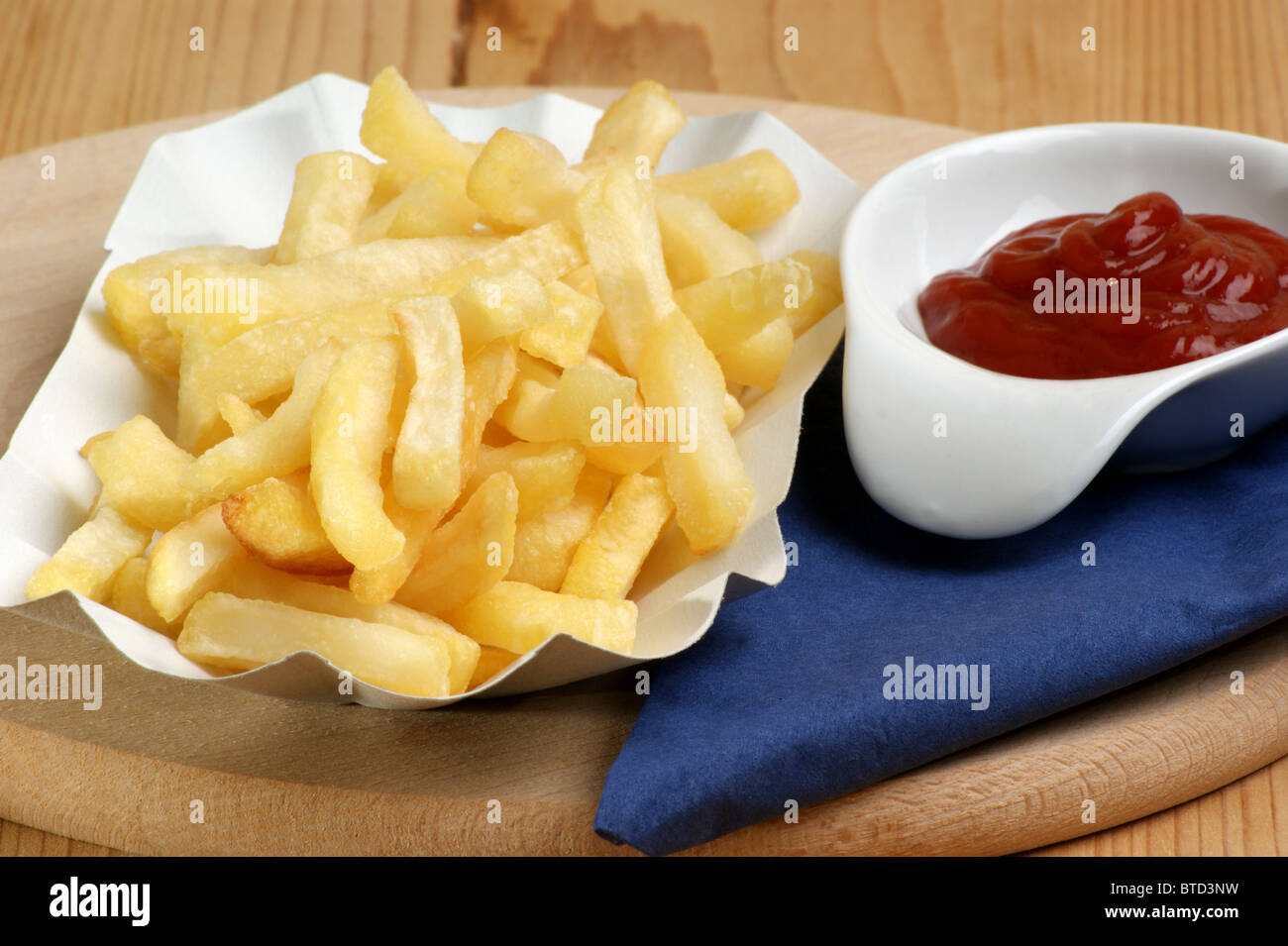 fat chips with ketchup Stock Photo - Alamy