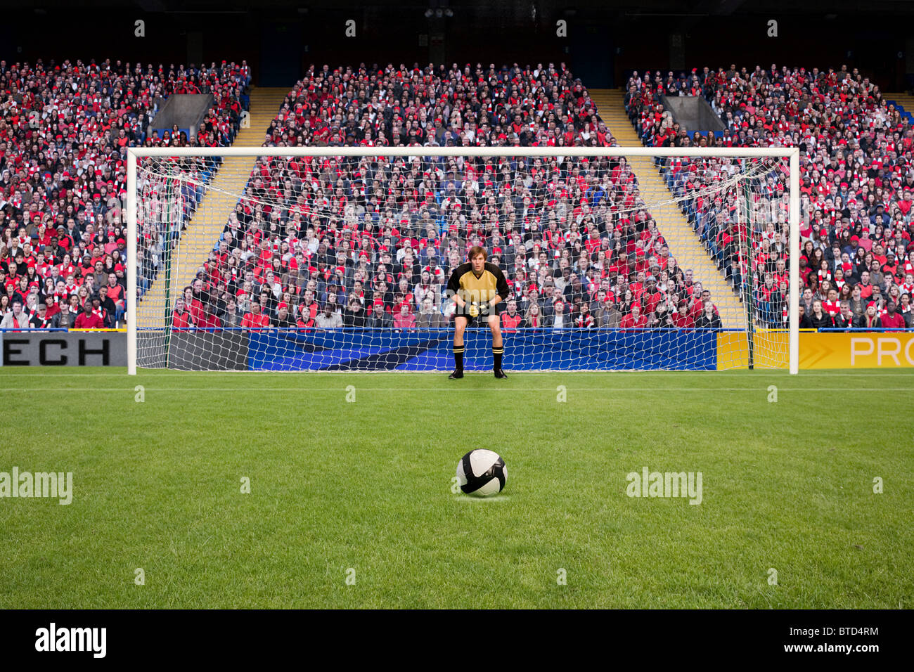 Goalkeeper and football Stock Photo - Alamy