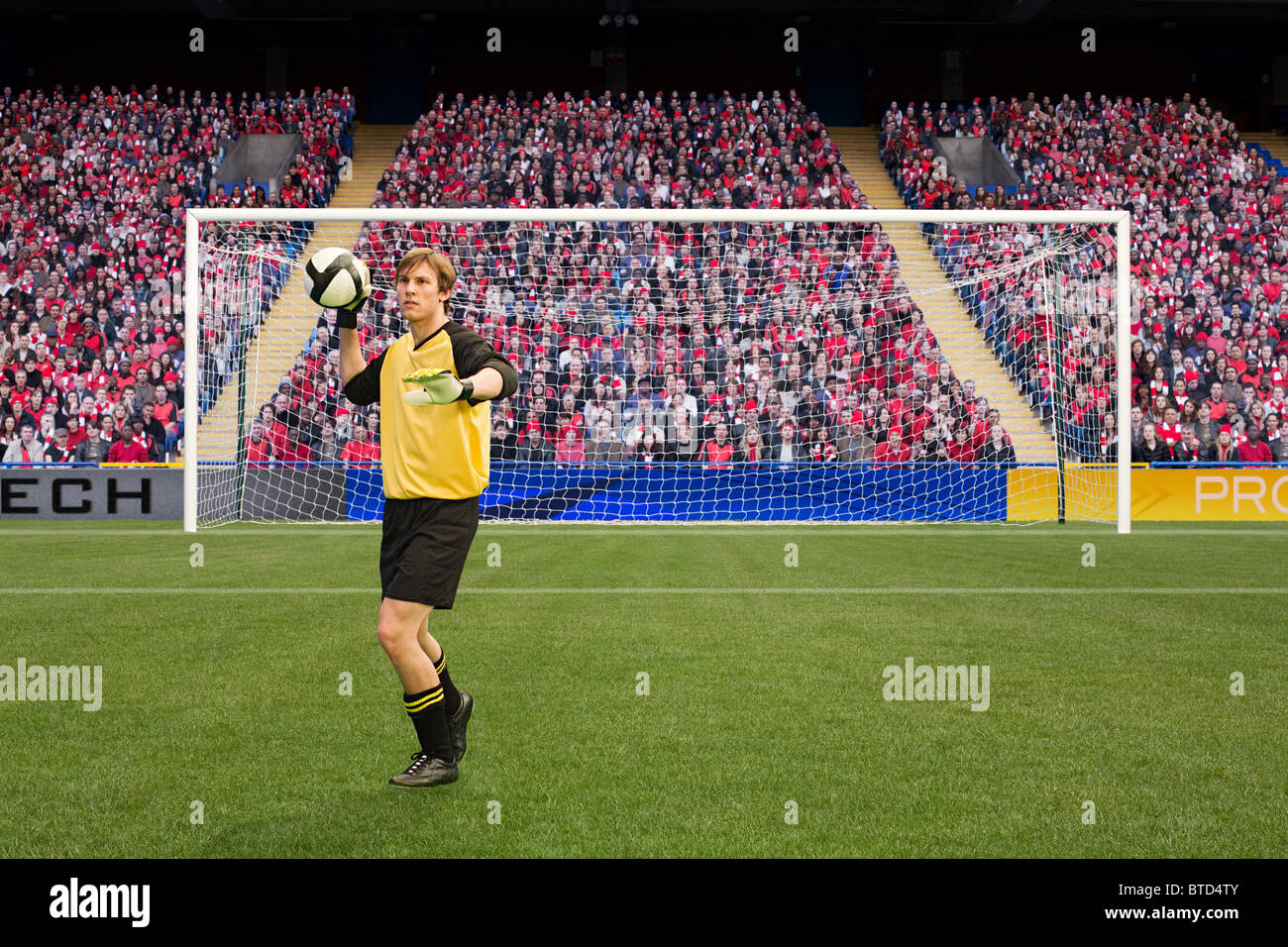 Football full length point hi-res stock photography and images - Alamy