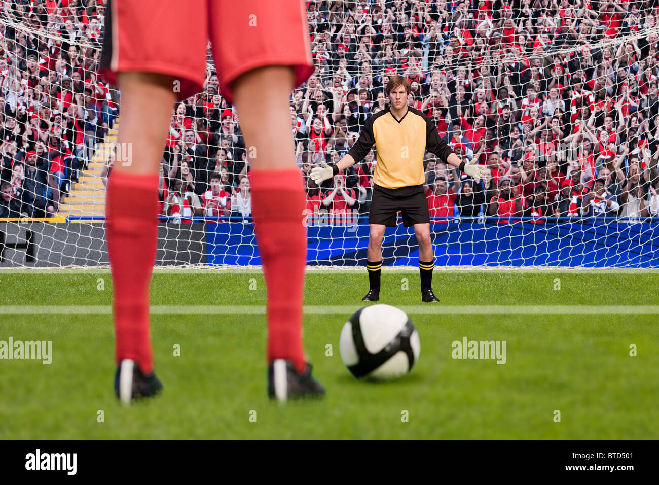 Goalkeeper anticipating free kick Stock Photo - Alamy