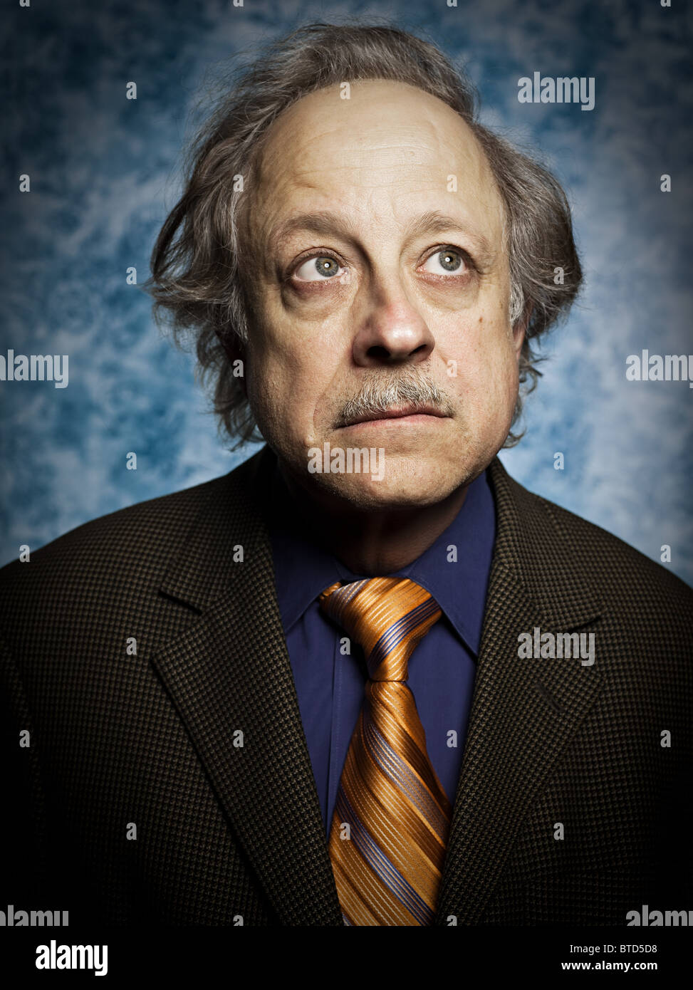 Studio portrait of balding senior man Stock Photo - Alamy
