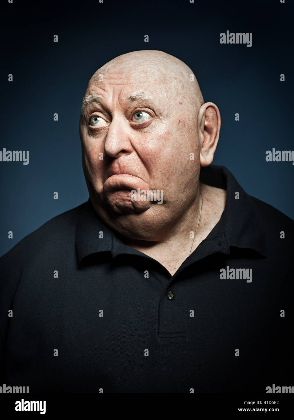 Studio portrait of sad senior man Stock Photo - Alamy