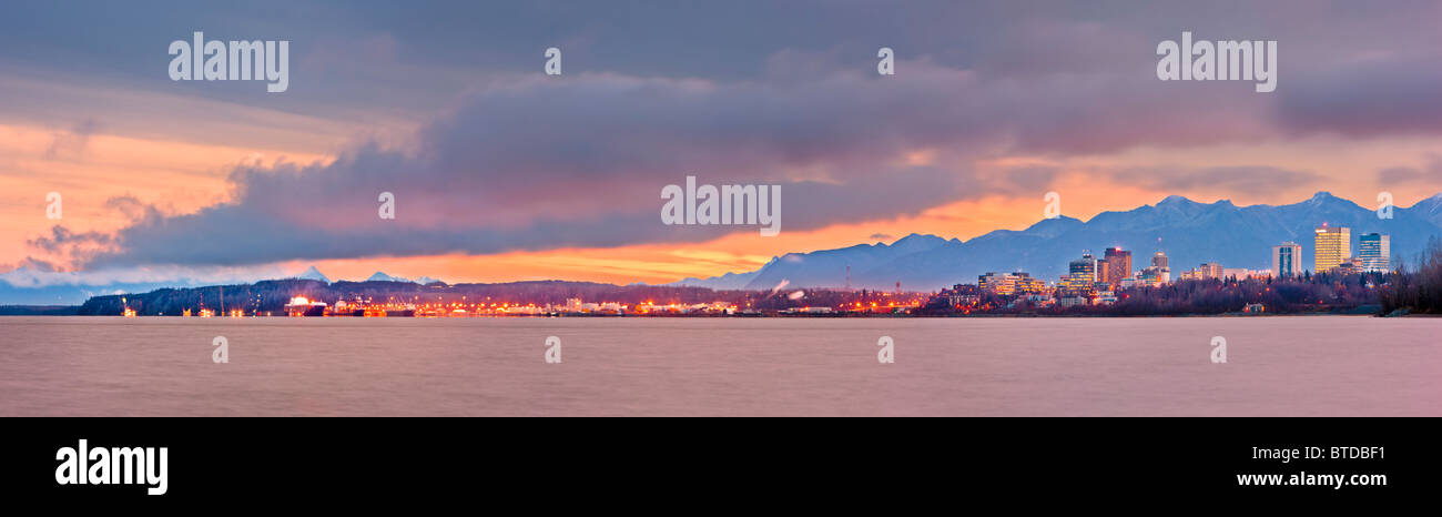 Panoramic skyline view of the sun rising over Anchorage, Cook Inlet and ...