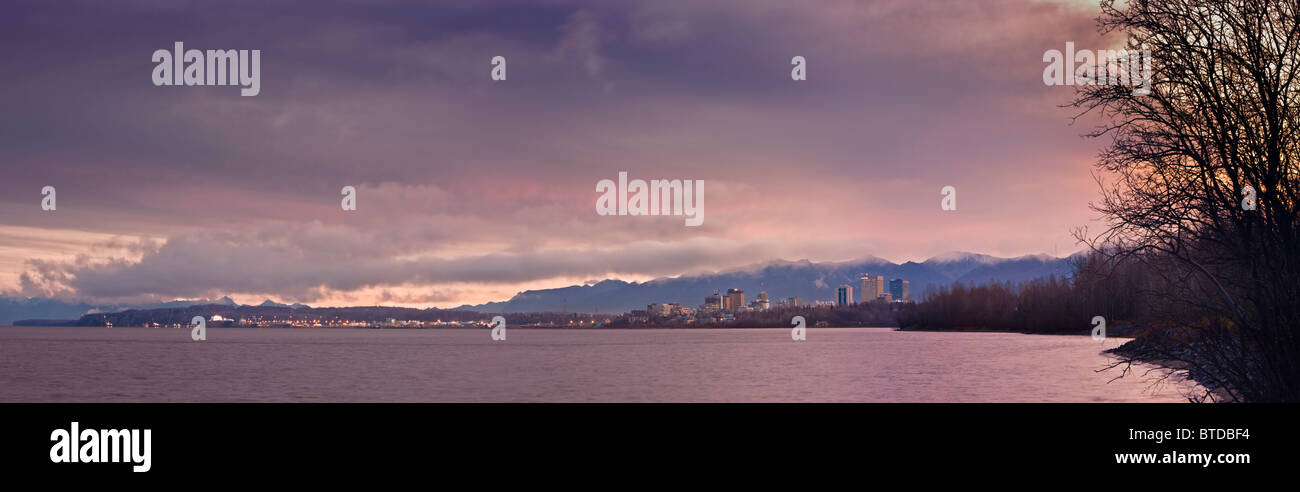 Panoramic skyline view of the sun rising over Anchorage, Cook Inlet and ...