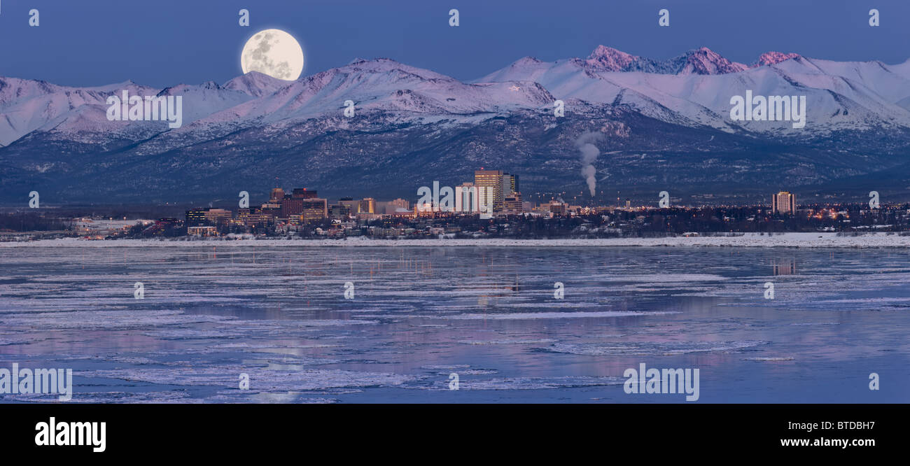 Panoramic of moon rising over the Anchorage skyline and Chugach ...