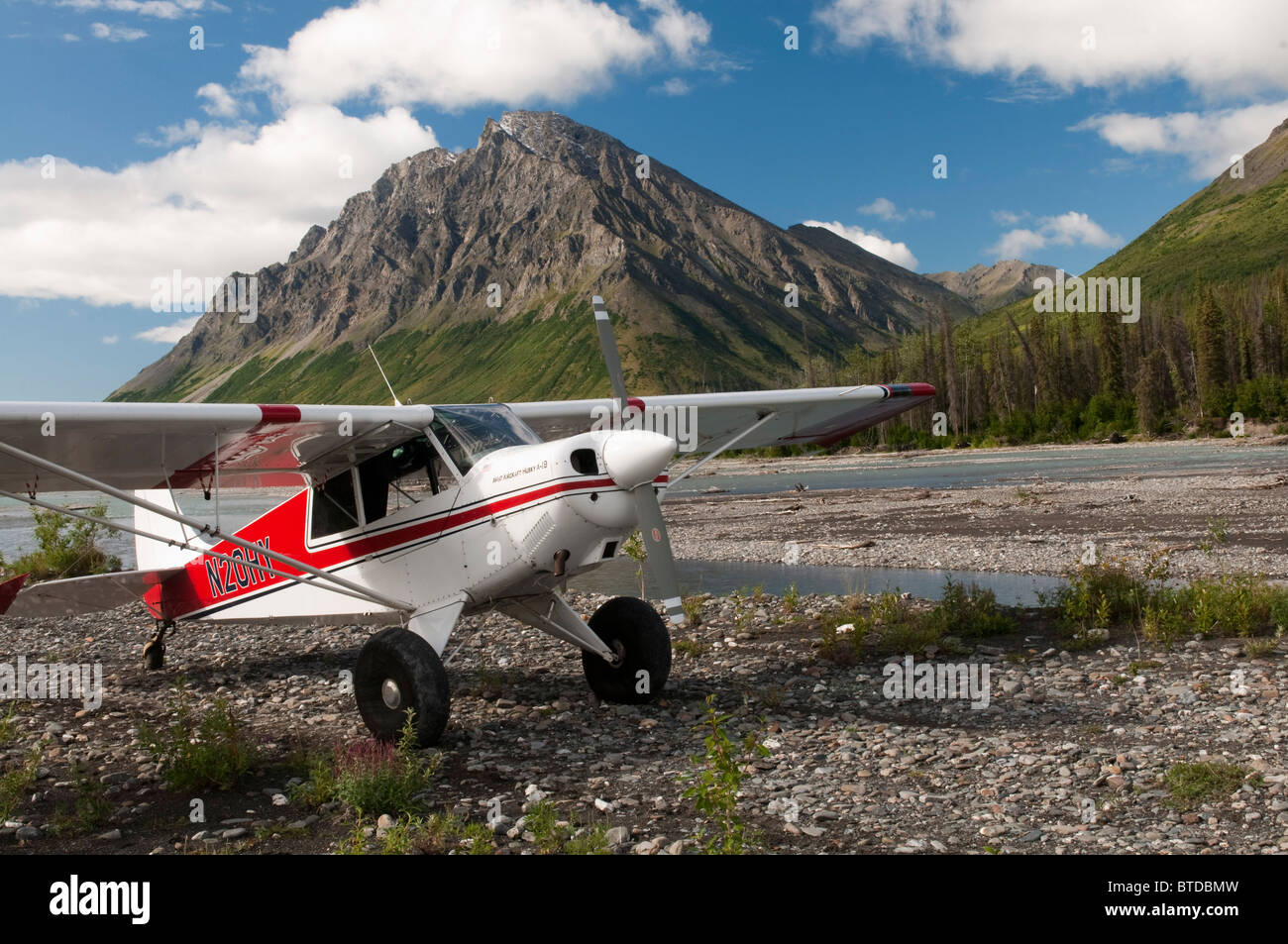 An Aviat Aircraft Husky A-1B rests on a gravel bar, North Fork of the ...