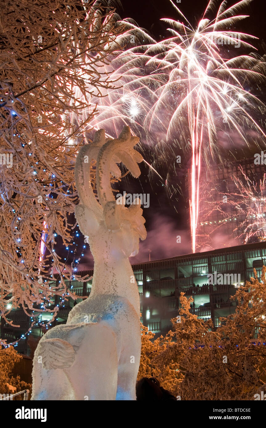 Frost covered caribou ice sculpure in Town Square with fireworks ...