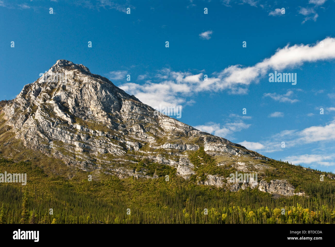 Massive granite peaks rise above the Alatna River in Gates of the ...