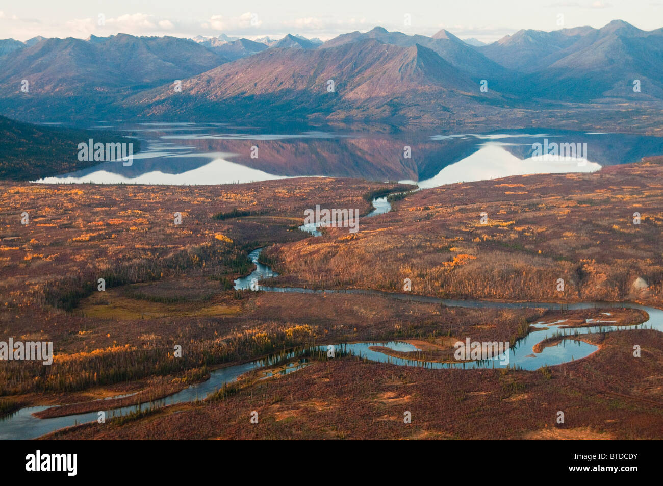 Aerial view of evening light refelecting in Walker Lake and Kobuk River ...