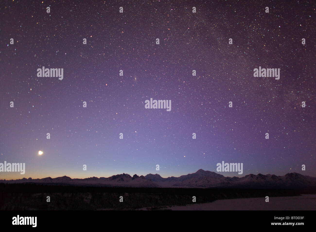 Night time view of Mt. McKinley with a star filled sky, the Milky Way ...