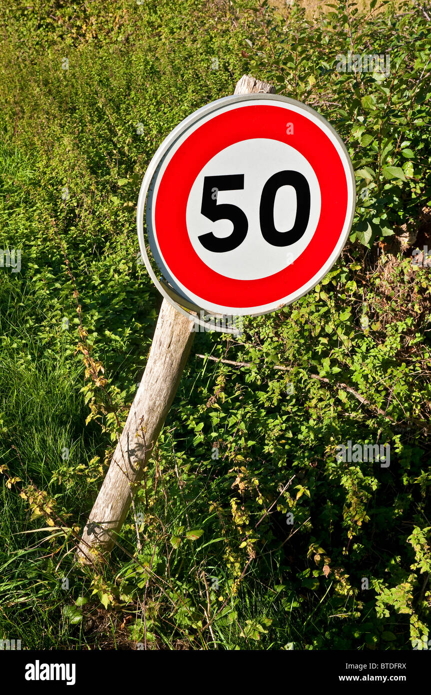 Modern road traffic sign indicating 50 kph speed limit - Indre-et-Loire ...