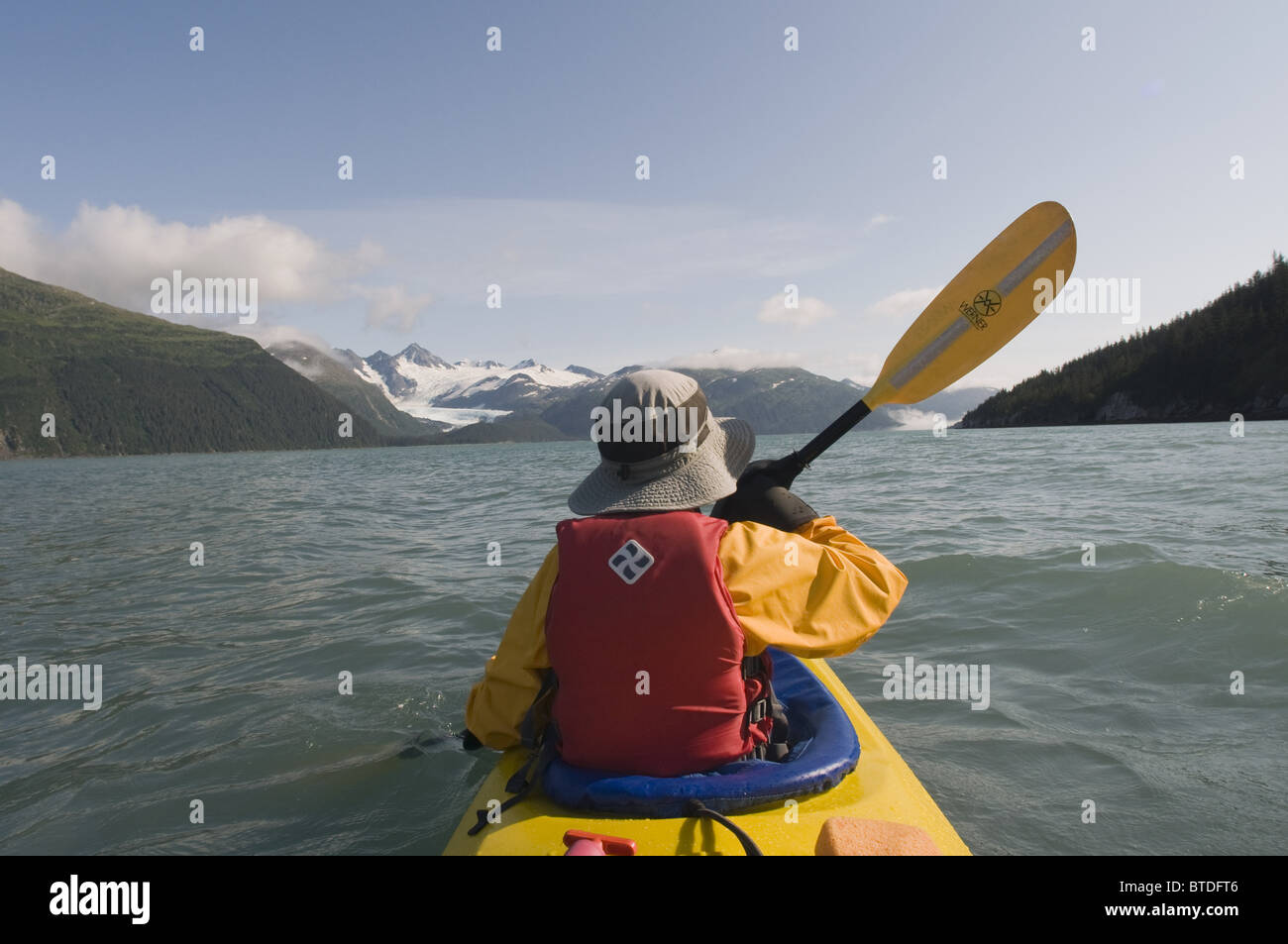 Person sea kayaking in Prince William Sound, near Whittier ...