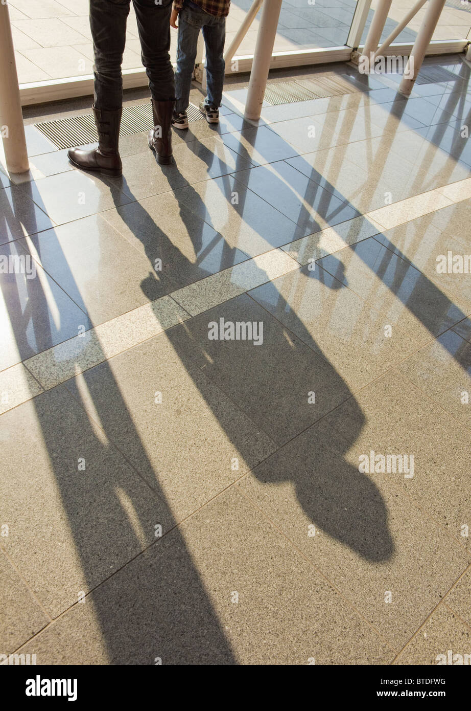 Shadow of father and son Stock Photo - Alamy