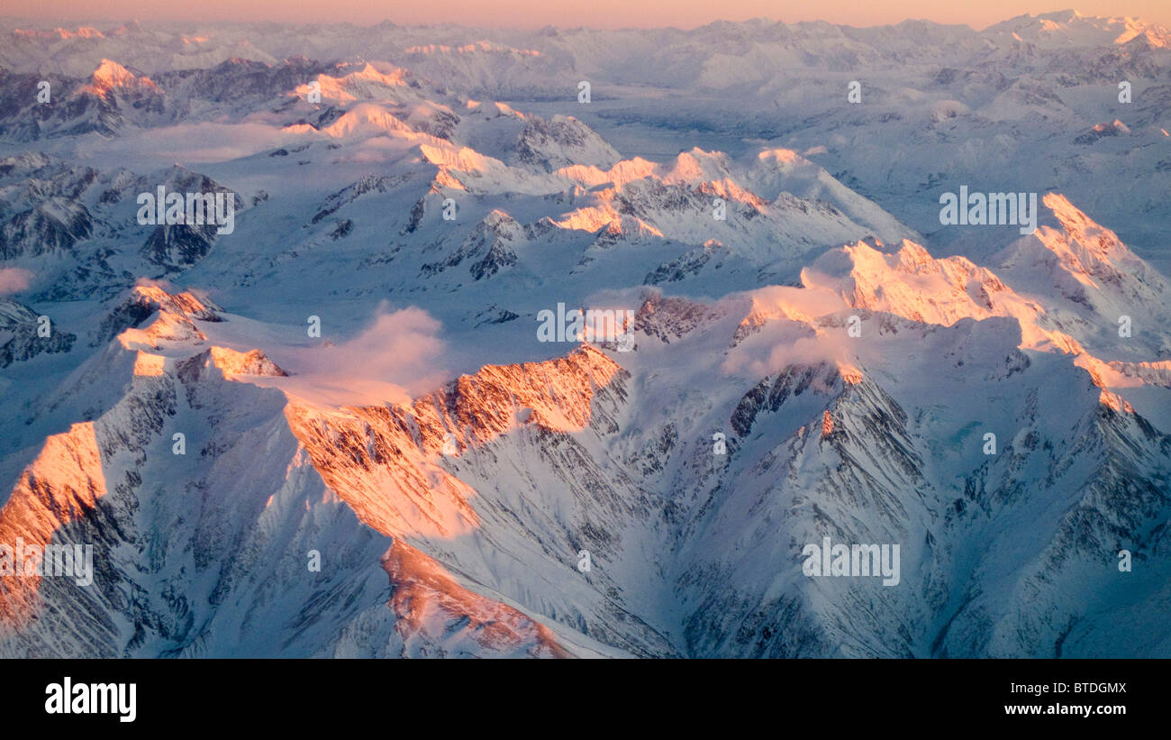 Aerial view of the Chugach Mountain range with sunrise alpenglow ...