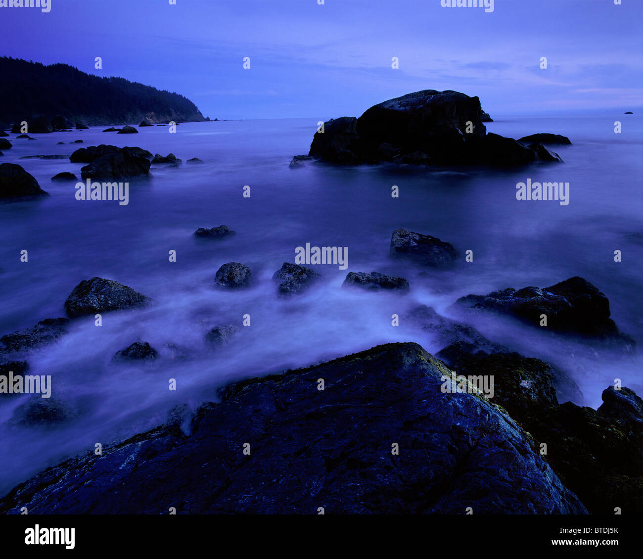 Twilight accents the blue hues creating a somber mood over the Pacific ...