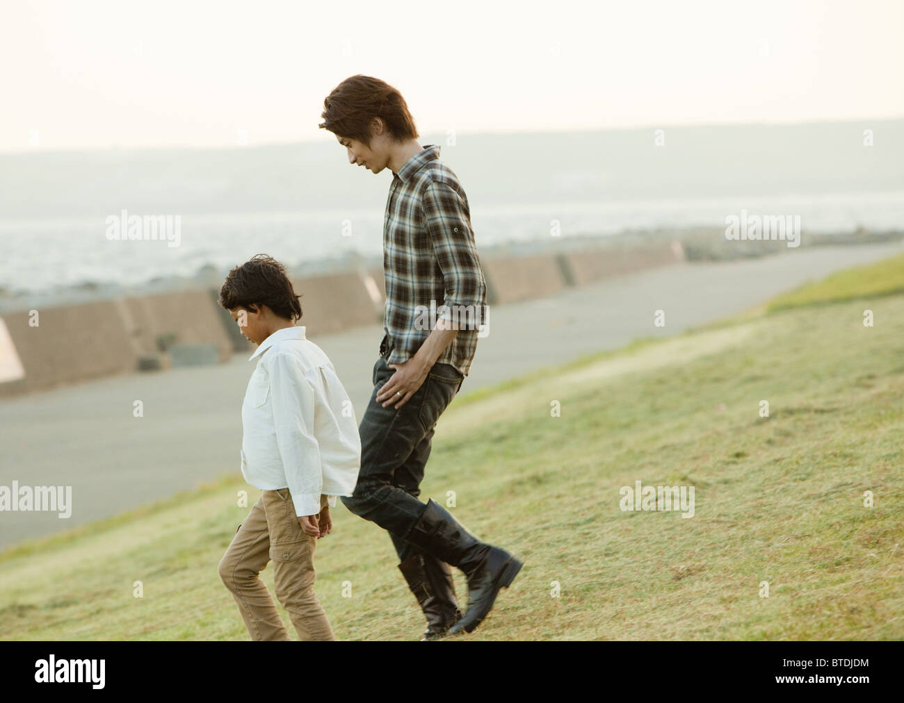 Walking on slope hi-res stock photography and images - Alamy