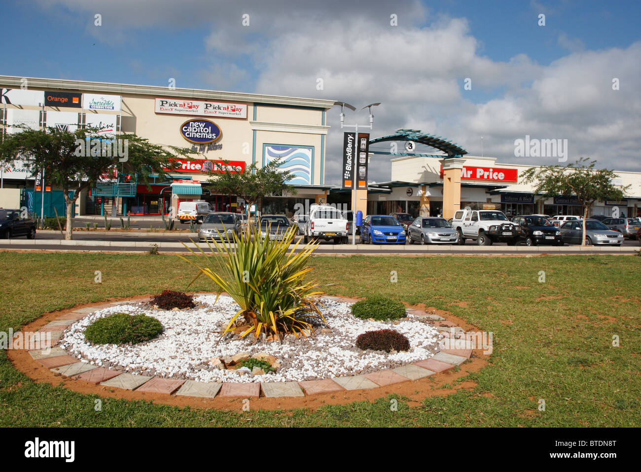 Riverwalk Shopping Mall from the outside with company advertising signs ...