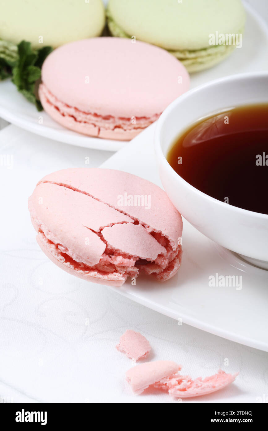 Cup of coffee and macaroon on a white background Stock Photo - Alamy